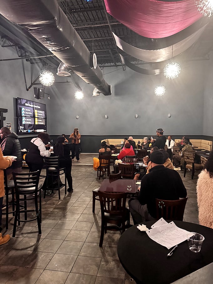 Exposed ceilings, cozy booths, and vibrant touches—the interior matches the menu's energy with style that feels both modern and inviting.