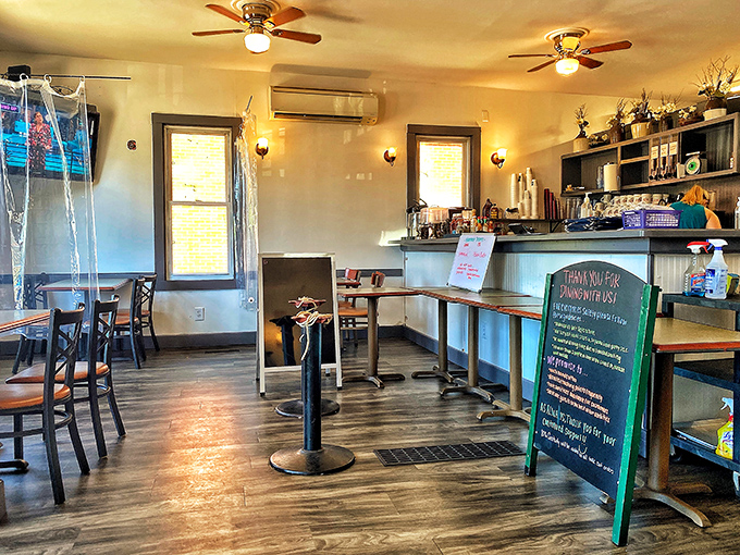 Wooden wainscoting and classic diner seating create that timeless atmosphere where conversations flow as easily as the coffee refills. 