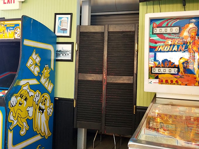 Vintage arcade games and pinball machines—because nothing completes a diner experience like a little pre-burger entertainment.