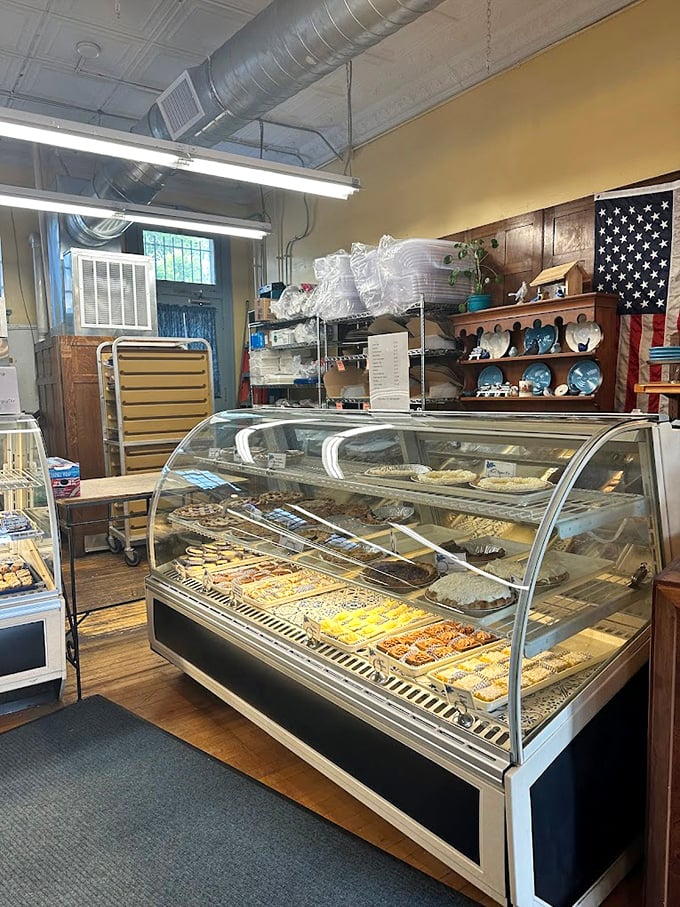 The display case—where diet plans go to die and "I'll just have one" becomes the opening line of a beautiful relationship with pastries.