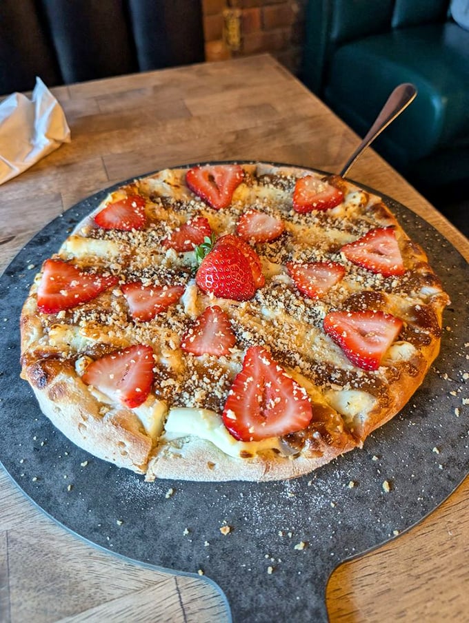 Strawberries and cream reimagined as pizza—dessert's answer to the question nobody asked but everybody needs.