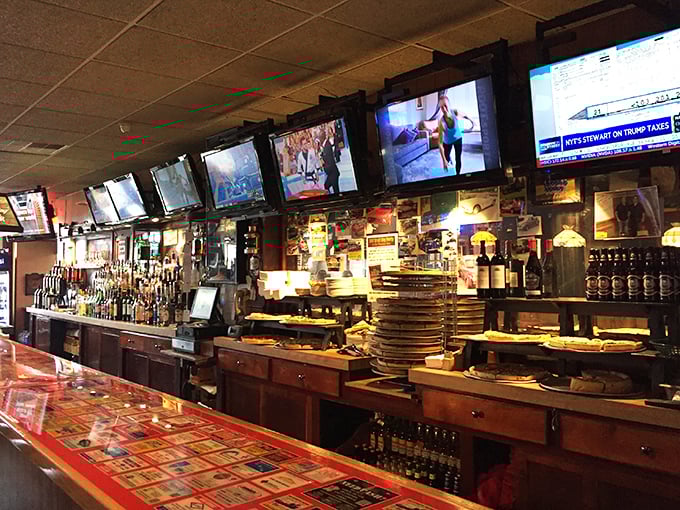 The bar area – where sports fans gather, locals swap stories, and nobody minds if you linger over that last slice of pizza.