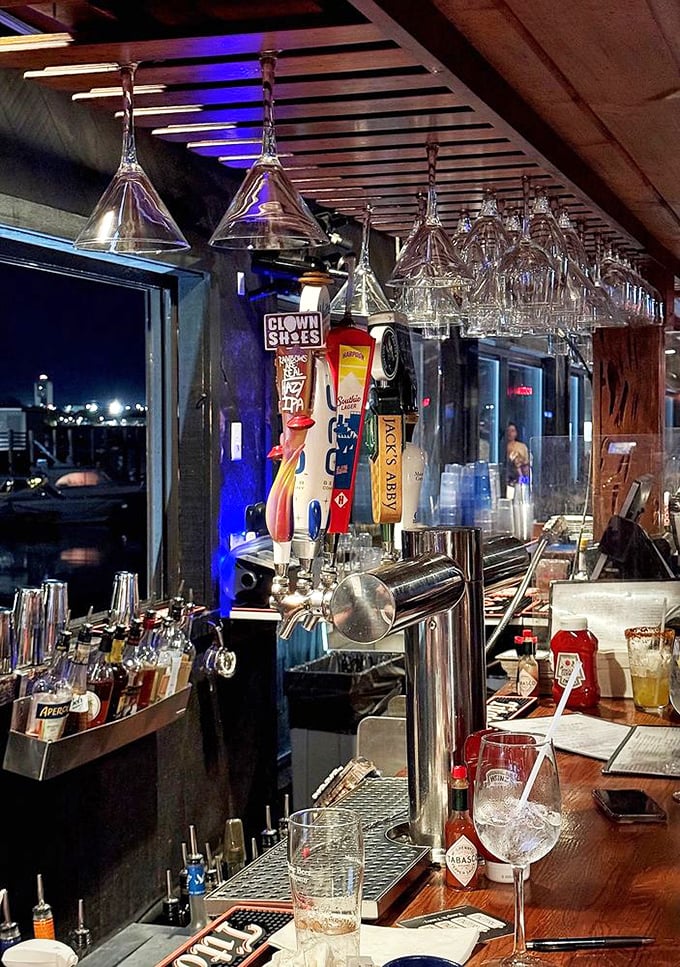 Where maritime meets mixology—a bar stocked with local brews and spirits, ready to complement that bowl of legendary chowder.