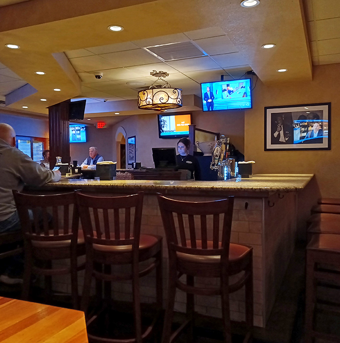 The bar area – where "I'll just have a quick drink" turns into "I'll take the full lasagna, please" faster than you can say "Salute!"