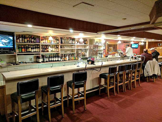 The bar at Wiederholt's – where Old Fashioneds are properly muddled and the bartender might actually remember your name. Cheers to that.
