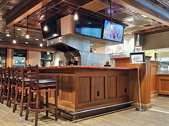 The heart of any great diner – a well-designed bar area where efficiency meets hospitality under the glow of pendant lights.