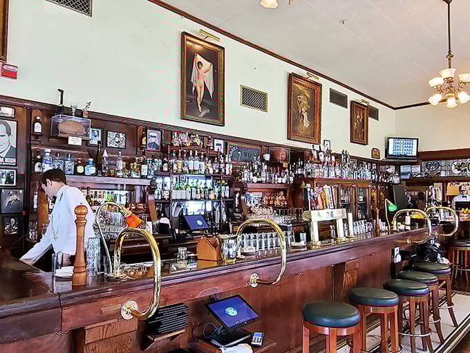 The bar's extensive collection isn't just alcohol – it's liquid history in bottles, with bartenders who know exactly which one you need.