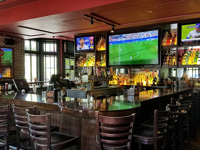 A bar designed for both serious sports watching and serious cocktail appreciation – multitasking at its finest.