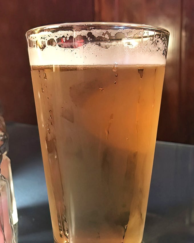 A cold beer at Mary's—where the simple pleasure of a perfectly poured pint reminds you that happiness doesn't need to be complicated.