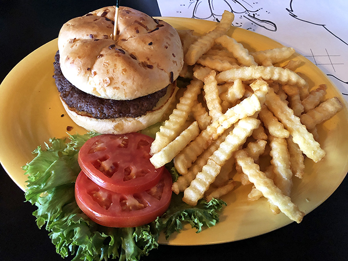 The classic American love story: burger meets fries on a yellow plate, and they live happily ever after in your stomach.