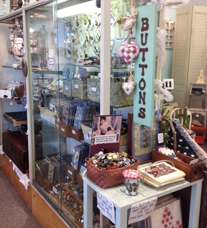 Button collectors, shield your eyes! This display case is what vintage dreams are made of—tiny treasures organized with museum-worthy precision.