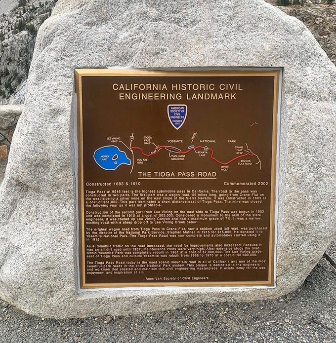 Engineering meets wilderness in perfect harmony. This plaque tells the story of human ingenuity carving a path through some of America's most formidable terrain.