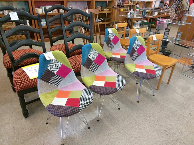 The chair lineup: traditional meets patchwork modern in a furniture version of "The Odd Couple" that somehow works perfectly together.