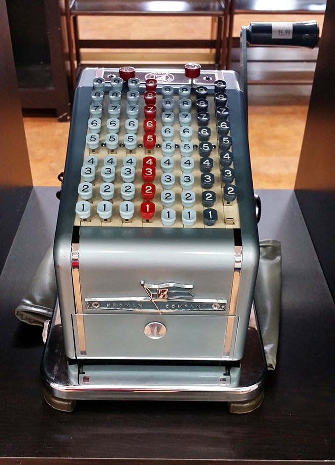This vintage adding machine isn't just a calculator—it's a time machine to when "spreadsheet" meant actual sheets of paper spread across an actual desk.