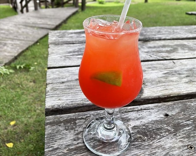 A refreshing fruit punch that offers sweet relief after a marathon of comfort food. The lime wedge isn't garnish—it's necessary balance.