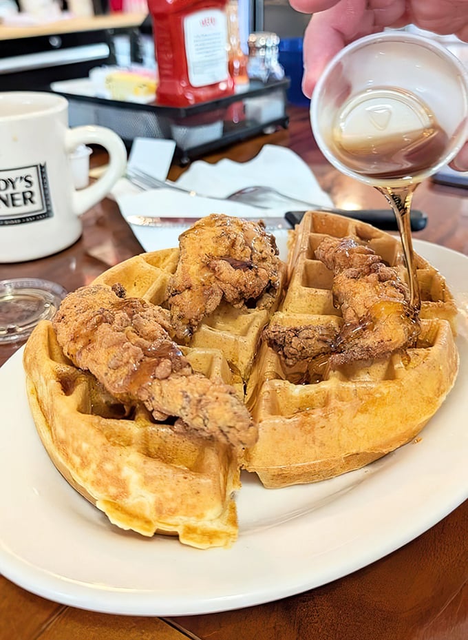 Chicken and waffles: the culinary odd couple that somehow works perfectly together, especially when maple syrup cascades down like a sweet waterfall.