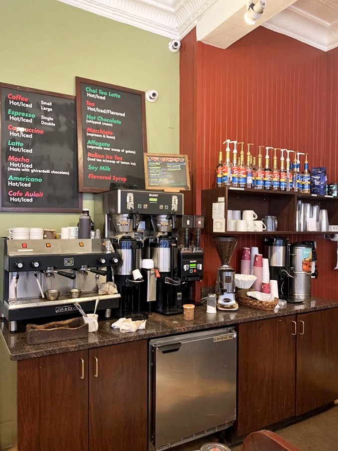The coffee station—command central for caffeine operations, where Italian tradition meets modern efficiency in a symphony of espresso machines and flavor syrups.