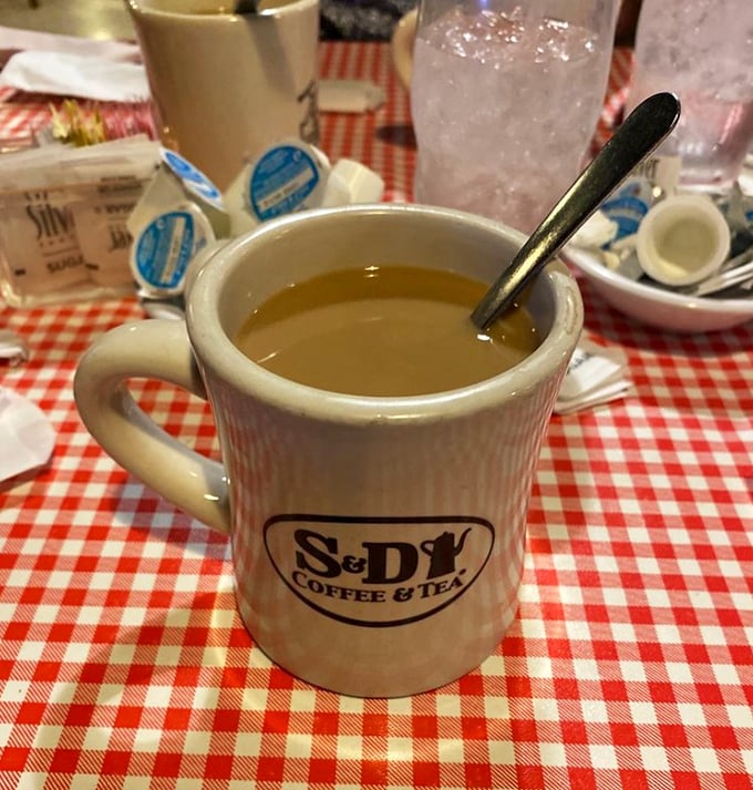 Coffee served in a mug substantial enough to get you through any morning crisis—no fancy latte art needed.