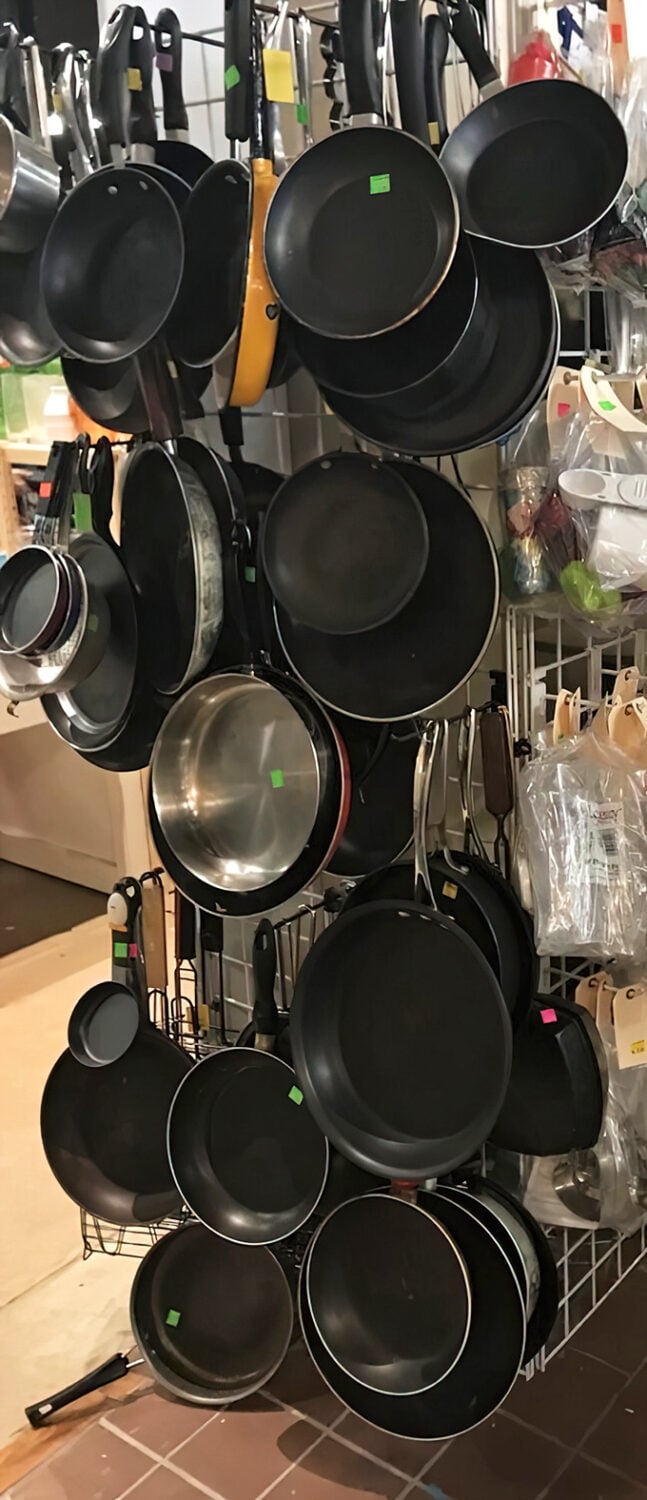 Pan-demonium in the best possible way! Quality cookware hangs ready for your next culinary adventure—from Sunday pancakes to holiday feasts.