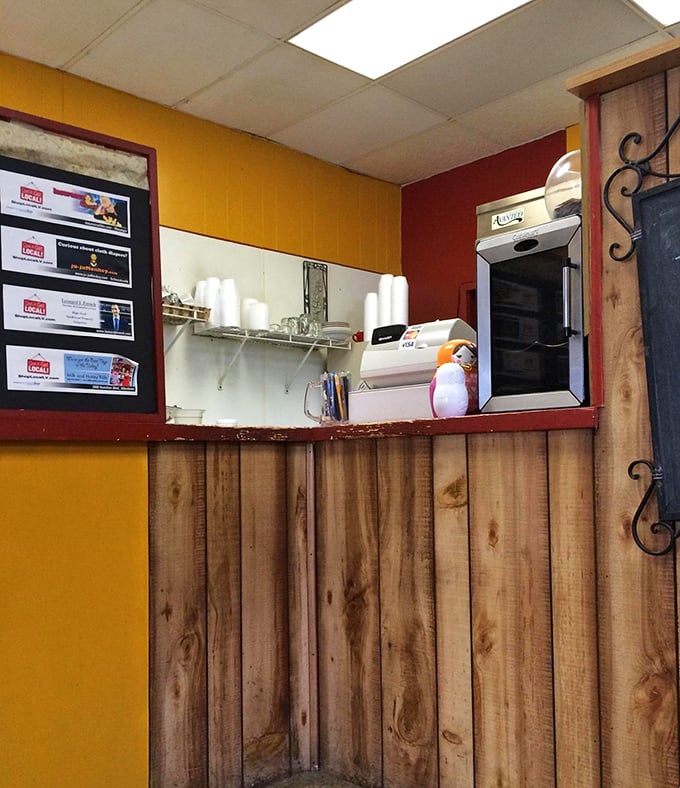 The heart of the operation – where magic happens behind wooden panels. Those handwritten specials aren't suggestions; they're commands from the culinary gods.