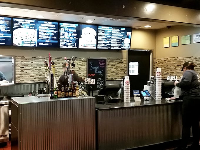 Where burger magic happens—the counter gleams with possibility as digital menus tempt you with choices you didn't know you needed.
