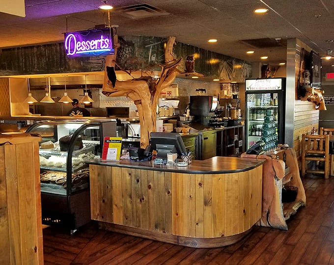 The dessert counter beckons with a neon sign – because after a lumberjack-sized meal, there's always mysteriously room for pie.