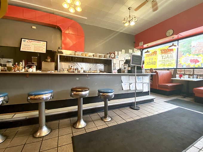 The heart of any good diner—where coffee refills flow freely and regulars don't even need to order before their usual appears.