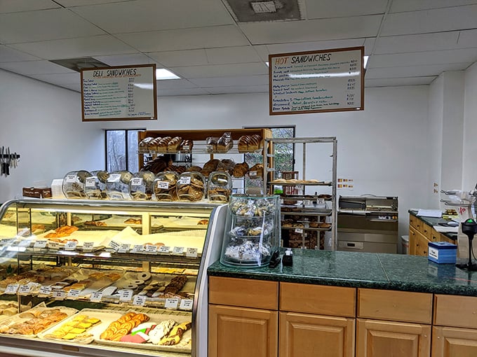 The bakery counter—where magic happens daily. Like Willy Wonka's factory, but with better bread and fewer troublesome children.