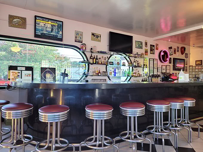 These chrome and vinyl stools have witnessed first dates, business deals, and countless "just one more cup of coffee" moments.