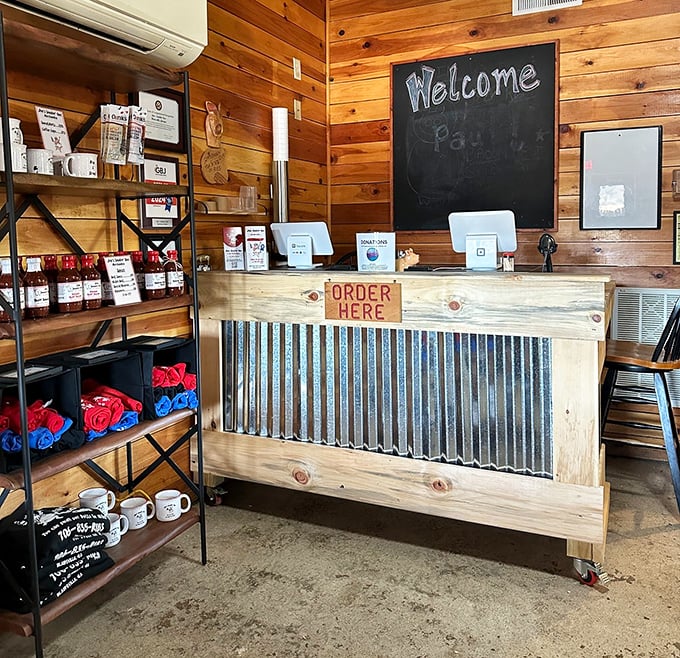 The rustic ordering counter says it all: no frills, no fuss, just focus on what matters—getting amazing barbecue into your hands as efficiently as possible.