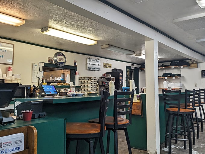 Counter seating—where solo diners become regulars and the coffee refills flow like conversation. The best seats for watching short-order magic happen.