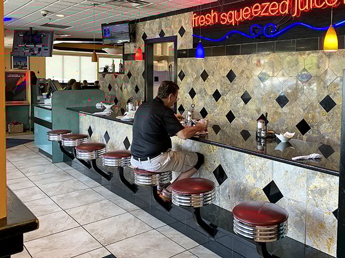 Counter seating with a view of the action – dinner theater at its finest.