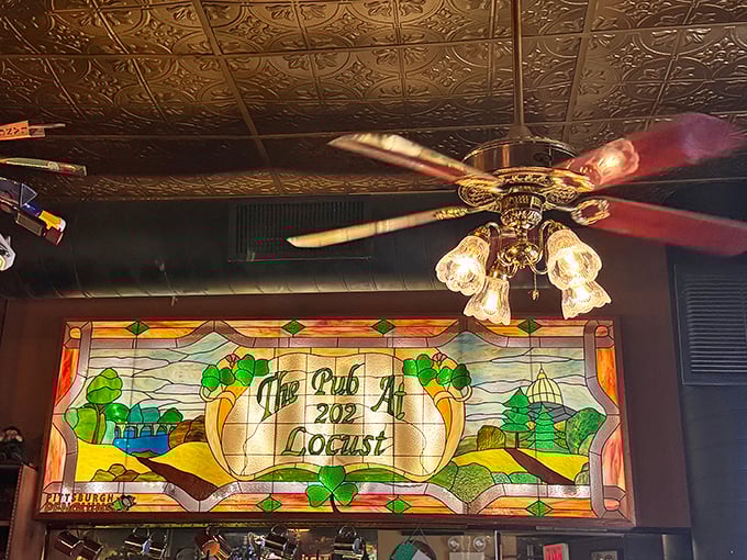 Ornate tin ceiling tiles and vintage fixtures transport you to another era, where conversation flows as freely as the spirits below.