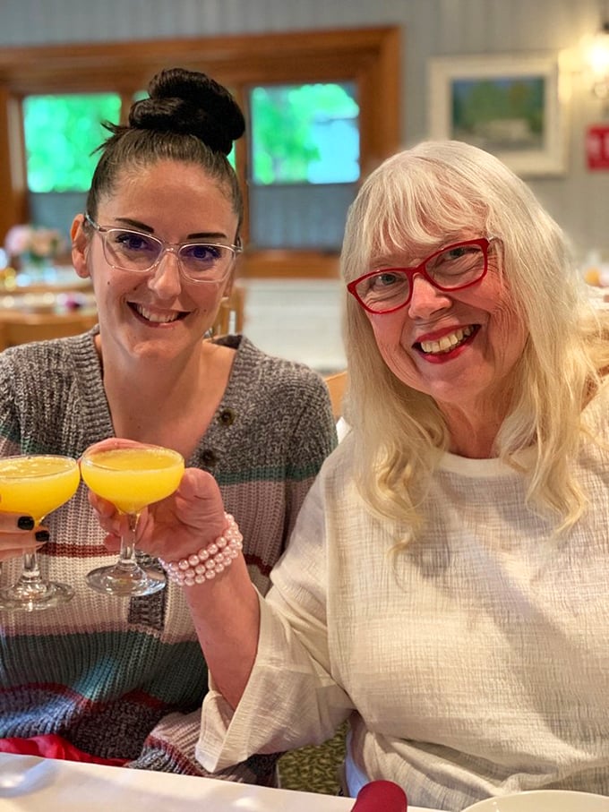 Toasting with mimosas—because nothing says "this meal is an event" like champagne with breakfast's favorite juice partner.