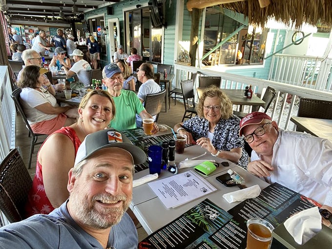 Where strangers become friends over cold beers and seafood platters – the true magic of Florida's neighborhood fish joints.