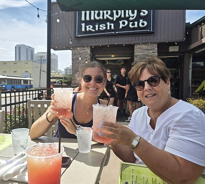 Outdoor drinks at Murphy's—where sunshine, good company, and colorful cocktails combine to create those perfect "wish you were here" moments.