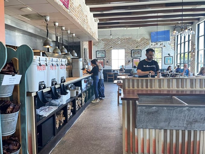 Where barbecue magic happens! Exposed brick, wooden beams, and stacks of firewood aren't just decoration – they're essential ingredients in this smoke-filled symphony.