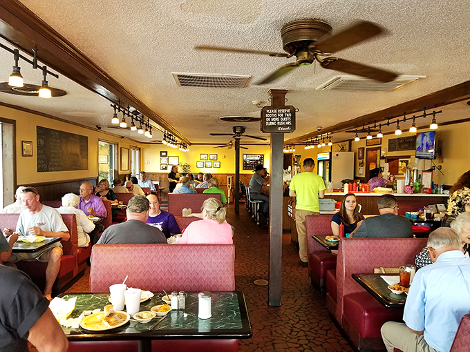 Locals fill these booths not just for the food, but for the community that's been built one breakfast at a time.