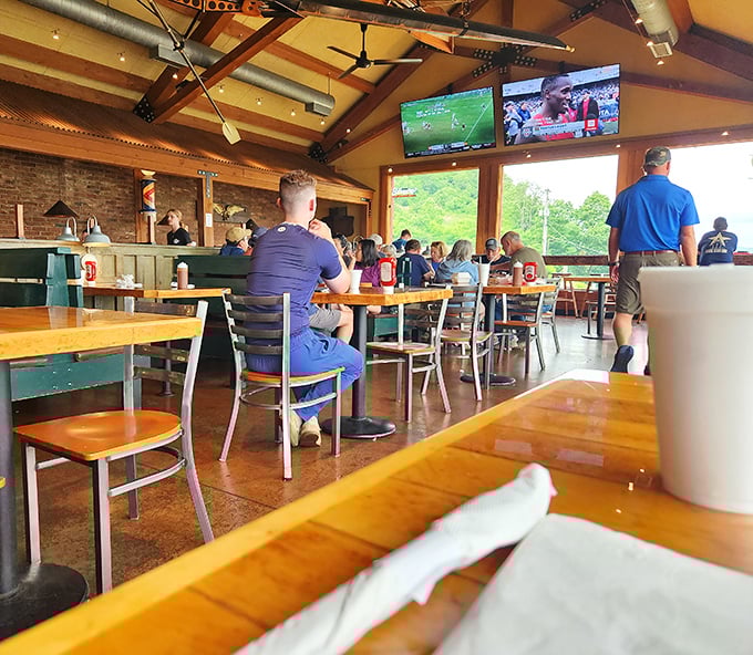 The dining room buzzes with the universal language of BBQ appreciation – napkins at the ready, conversations paused mid-bite for maximum enjoyment.