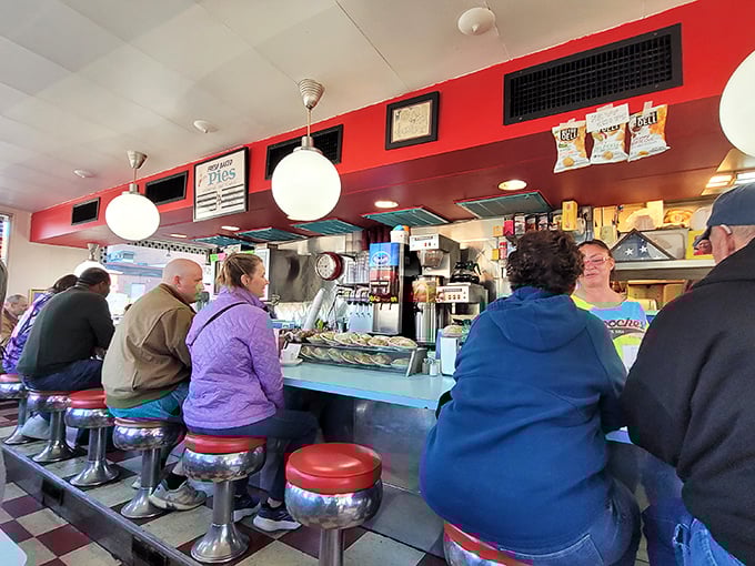 The counter seats—where solo diners become part of the Broadway family and regulars exchange news between bites of breakfast.