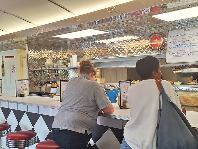 Where strangers become regulars and regulars become family—the counter and booths at The Diner on 55th have witnessed countless conversations and coffee refills.