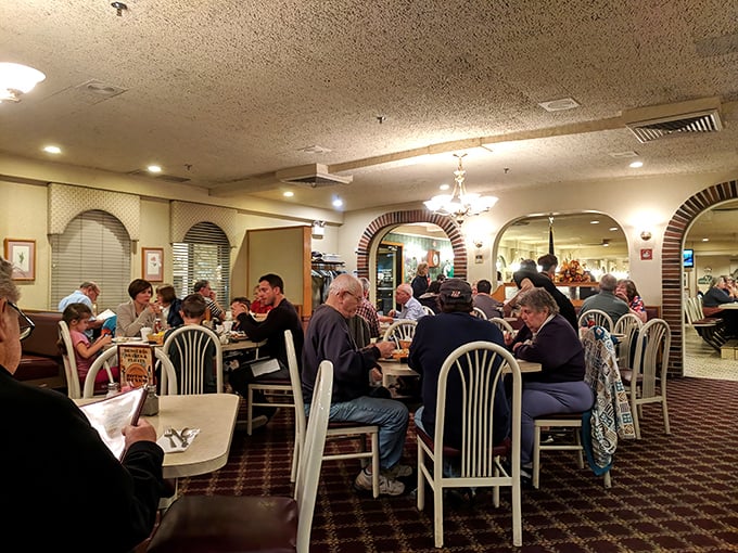 The true heart of any great diner—a dining room filled with people from all walks of life, united by the universal language of good food.
