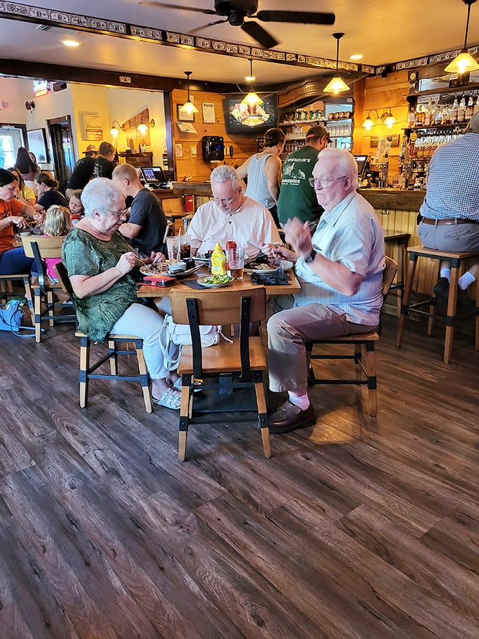 Where memories are made between bites. Notice how nobody's looking at their phones—the food commands that kind of undivided attention.