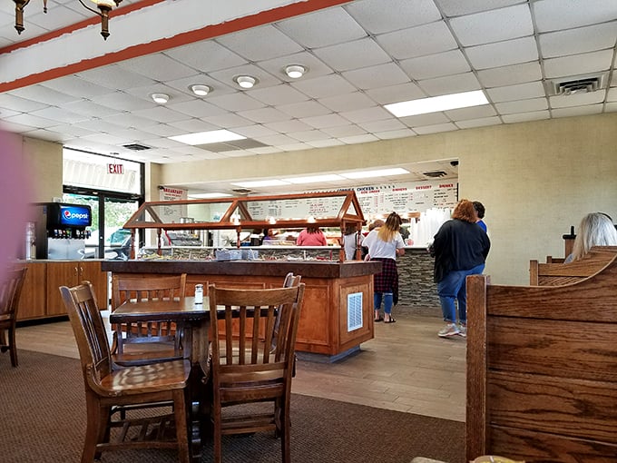 The serving line where magic happens daily, with staff who know the difference between cooking food and creating memories.