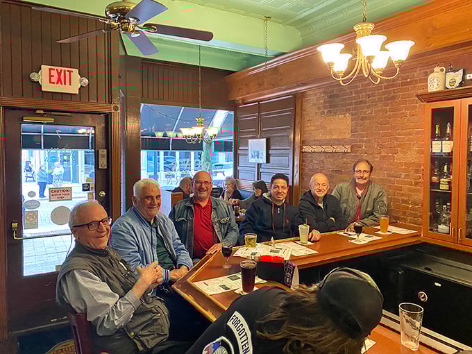 Where regulars become family. These gentlemen have probably solved all the world's problems over countless slices through the years.