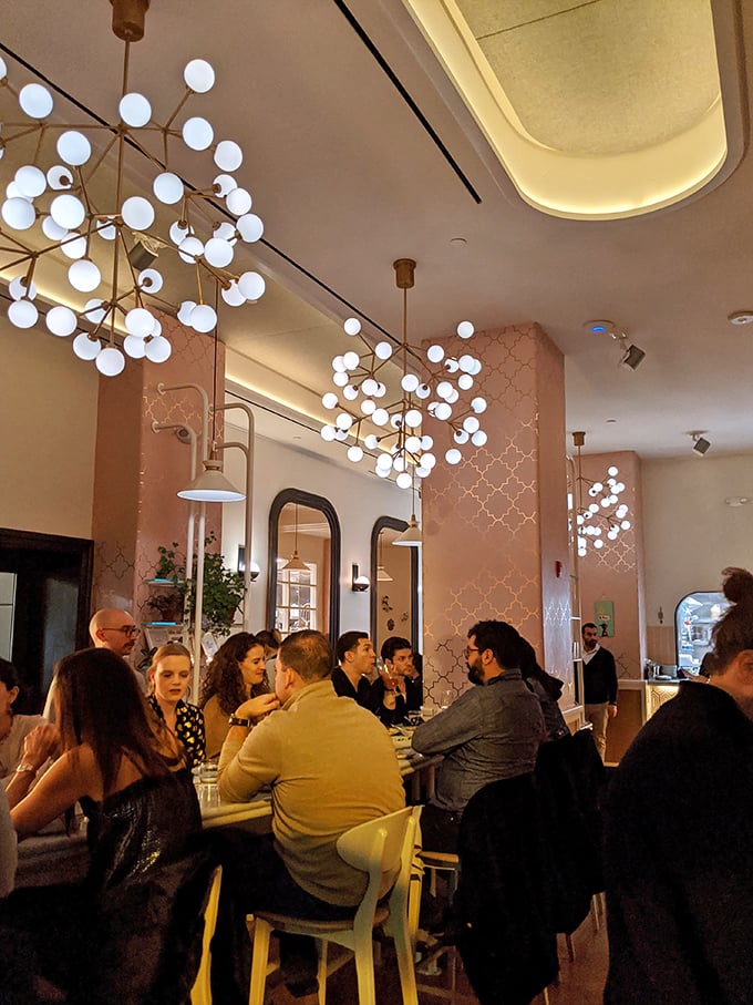 K'Far's dining room buzzes with the energy of people having religious experiences with carbs – the universal language of good food.