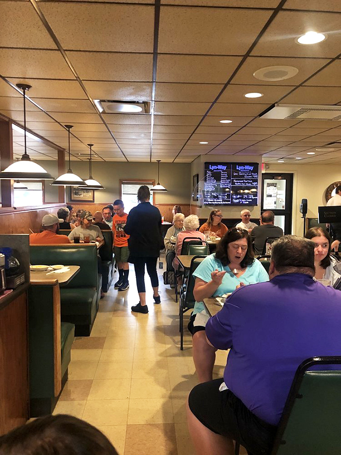 A packed dining room is the most honest review a restaurant can get. These diners didn't come for the ambiance—they came for food worth talking about.