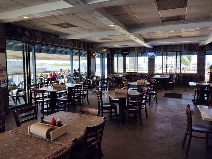 The dining room offers panoramic water views that rival the food for your attention. Every table feels like the captain's table.