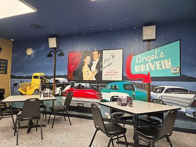 That drive-in mural doesn't just decorate the wall—it transports diners to evenings when dinner and a movie happened in the same place.