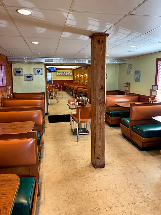 The dining room speaks volumes: no pretense, just well-worn booths that have supported decades of satisfied customers and their loosened belts.